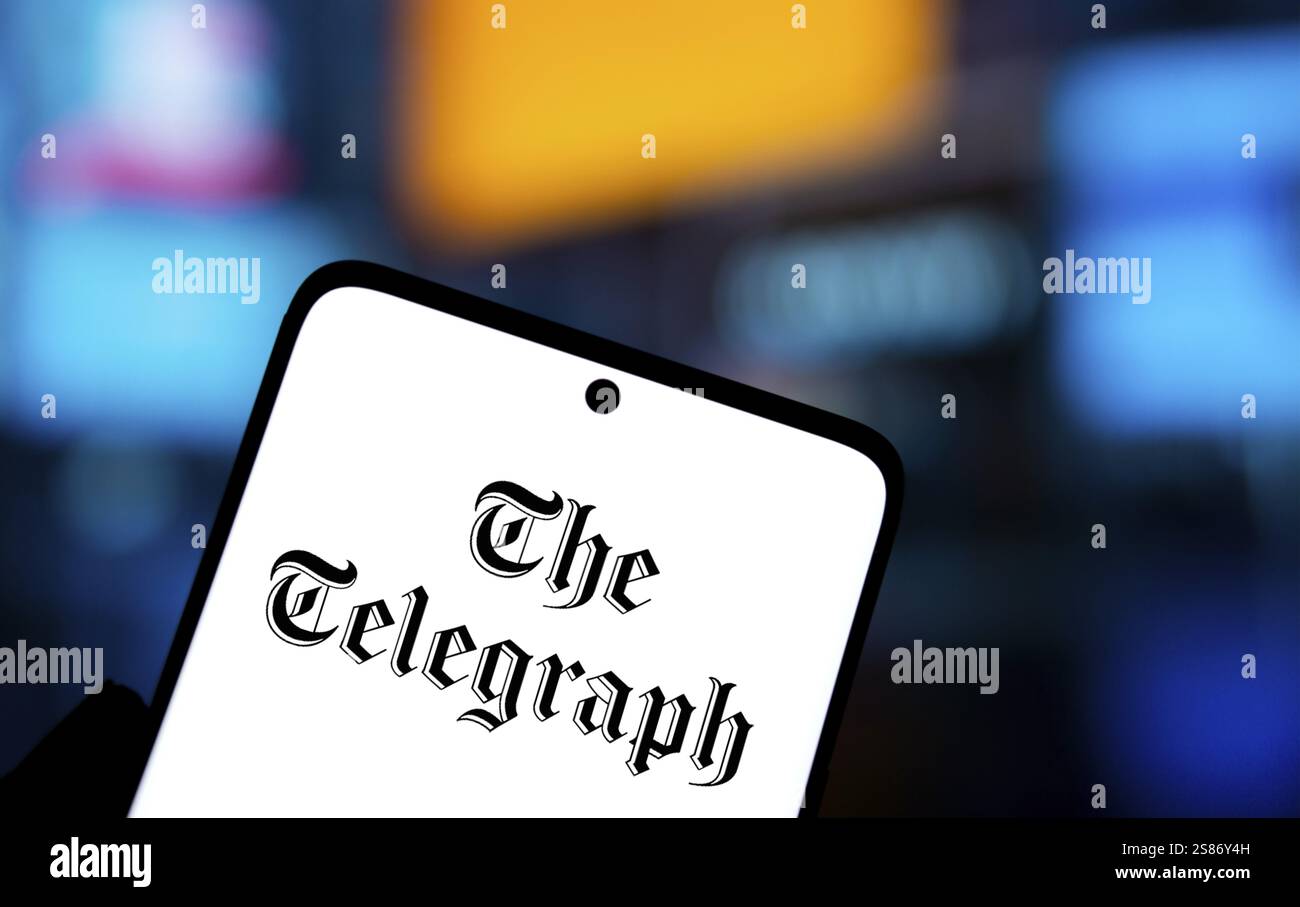 the telegraph logo is displayed on smartphone. The Telegraph is a ...