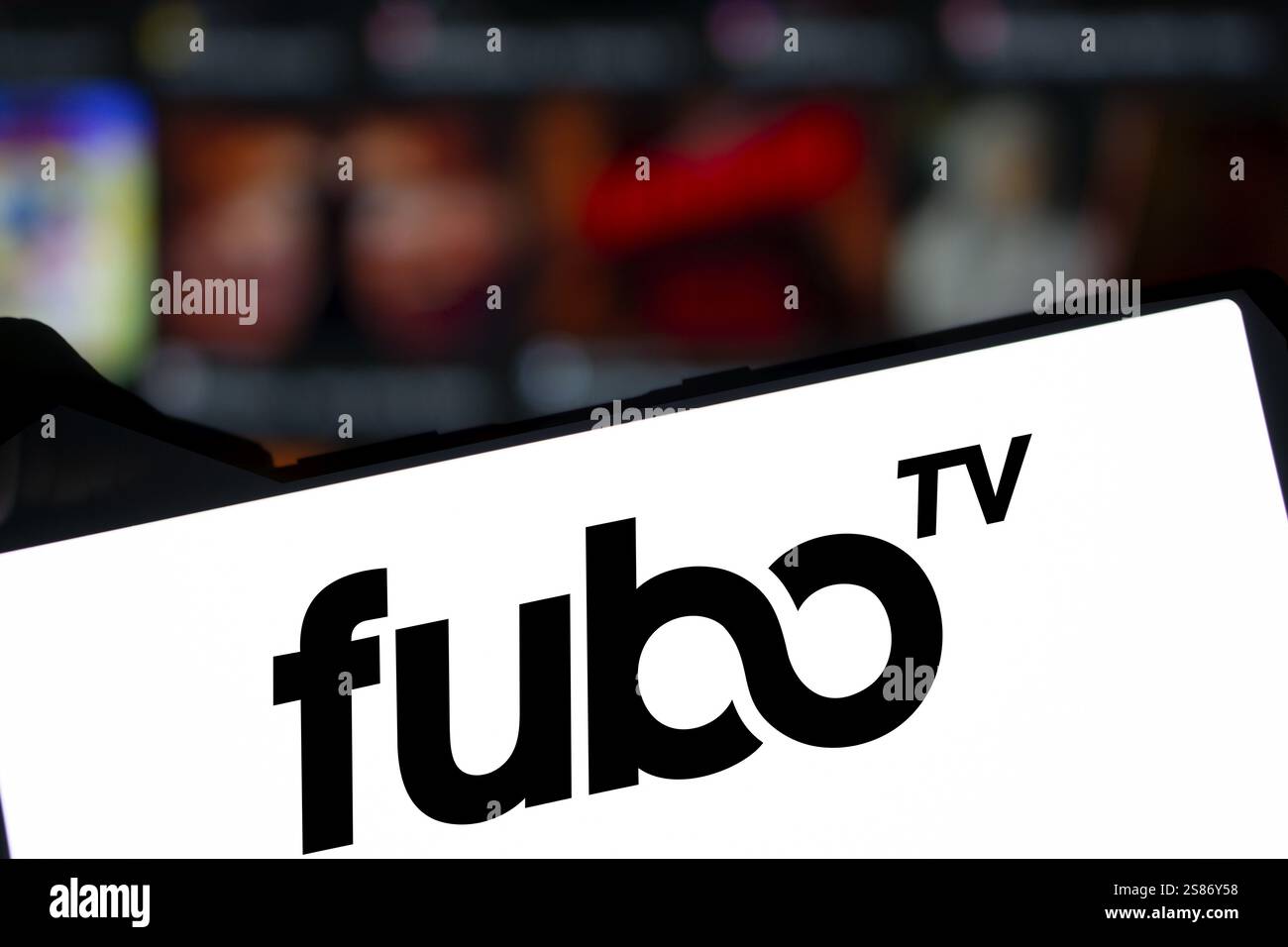 fubo tv logo is displayed on smartphone. FuboTV is an American streaming television service ...