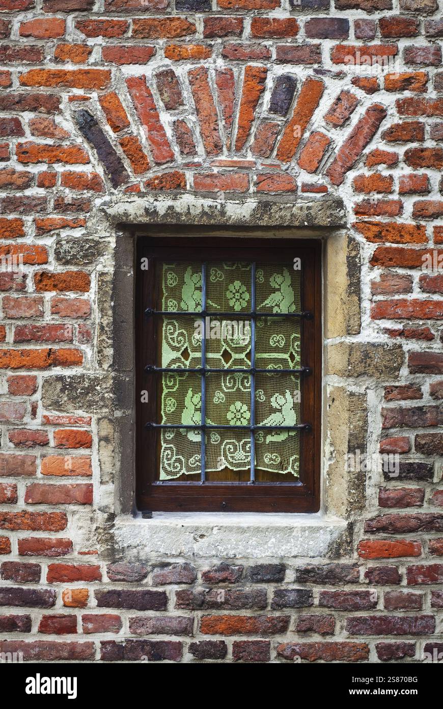 Window of a medieval building, very old brick wall, Belgium, Europe ...