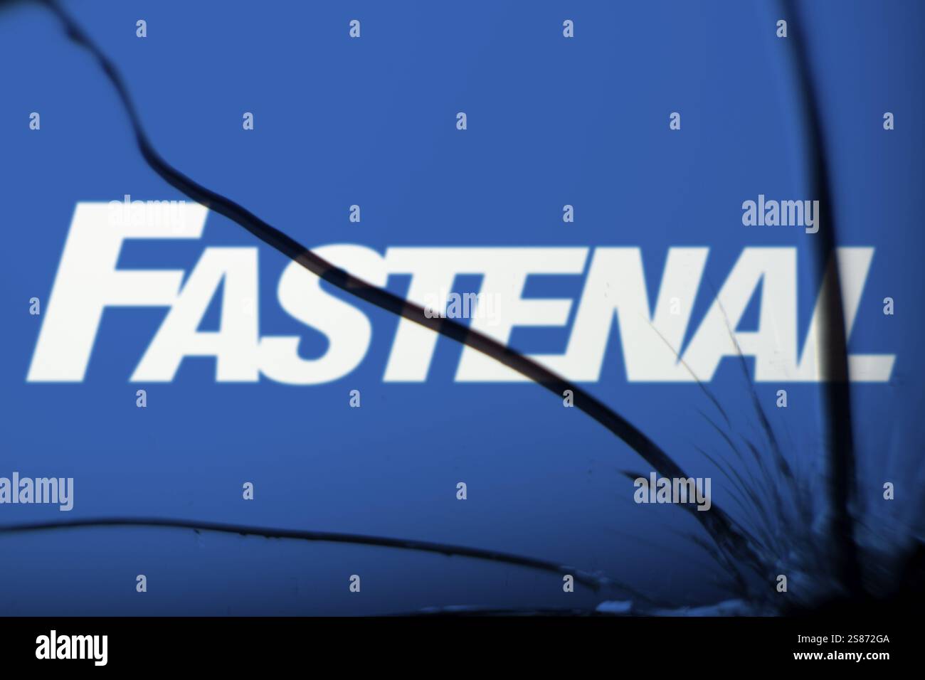 Fastenal logo is visible on the broken glass Stock Photo - Alamy