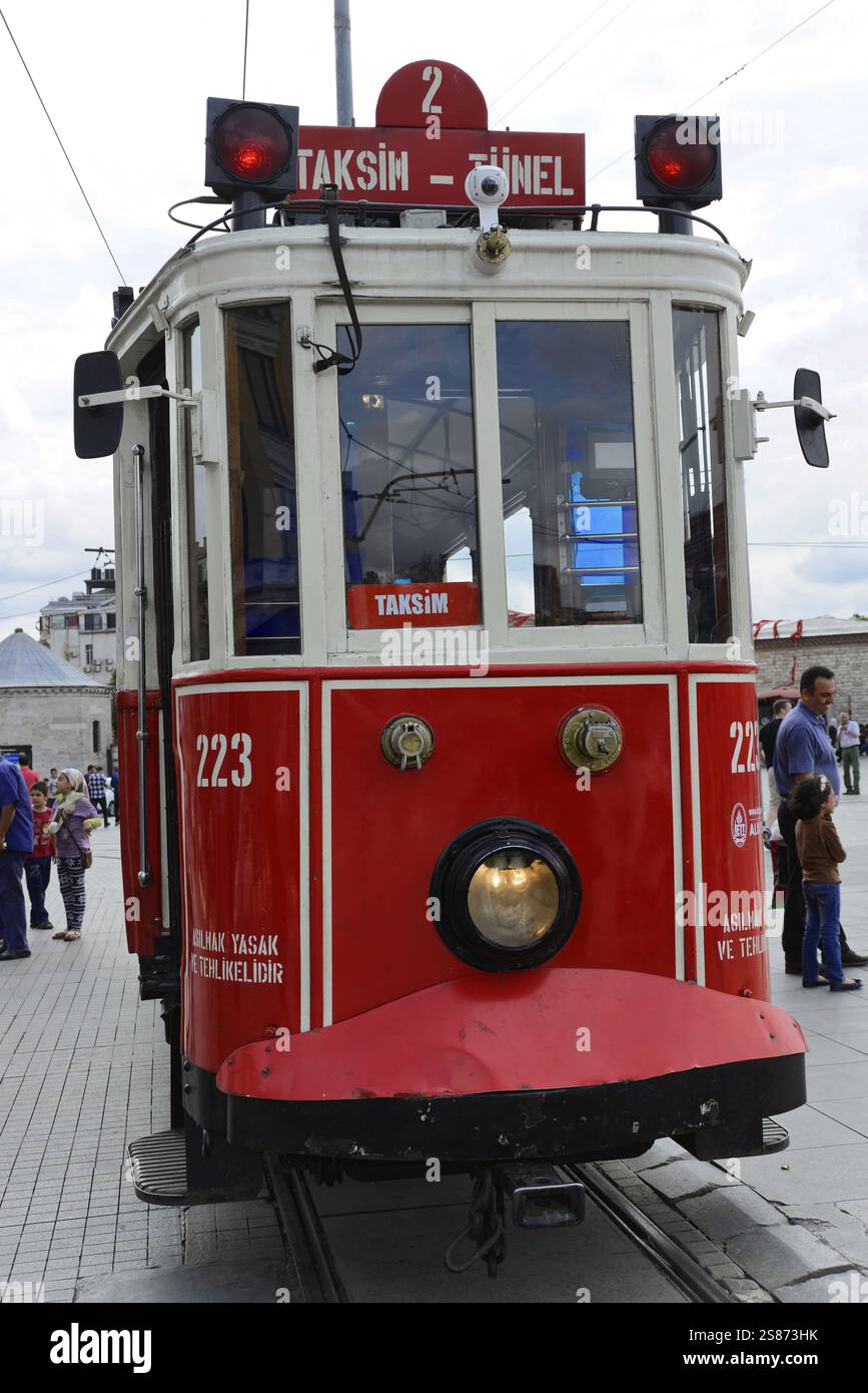 Historic tram Nostaljik Tramvay travelling through Istiklal Caddesi ...