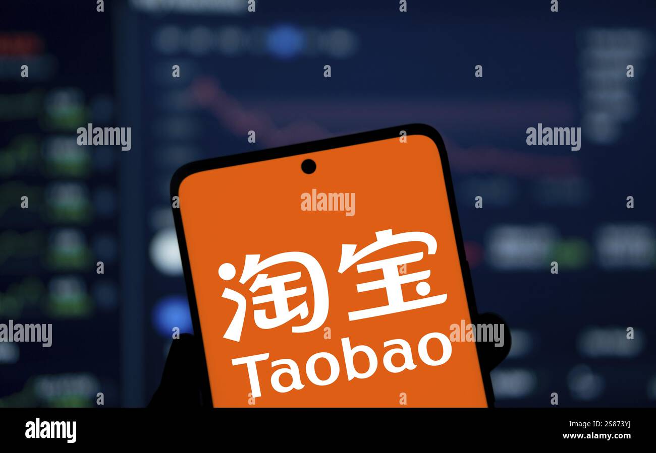 taobao logo is displayed on smartphone.Taobao is a Chinese online shopping platform Stock Photo ...