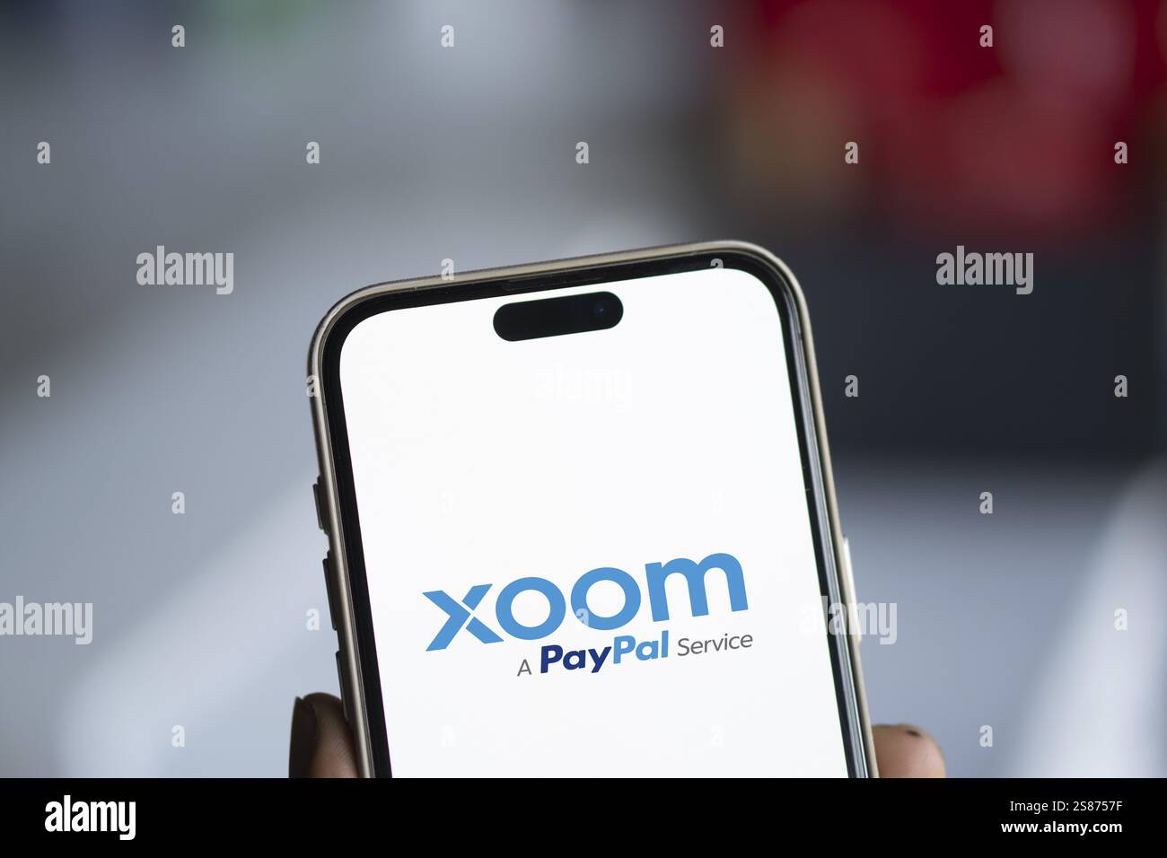 xoom logo is displayed on smartphone. Xoom Corporation is an electronic ...