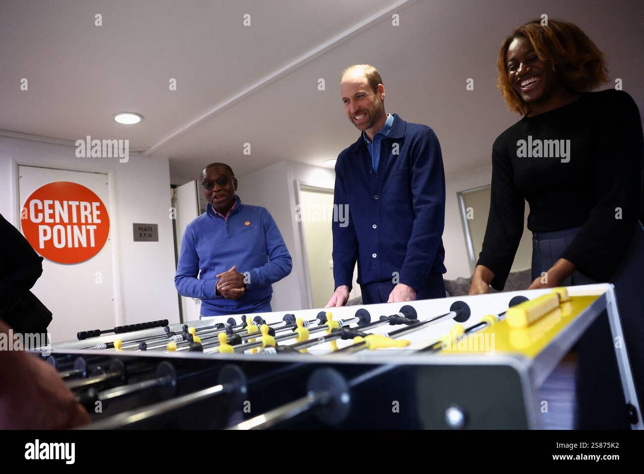 The Prince of Wales (centre) during a visit to Centrepoint in Ealing ...
