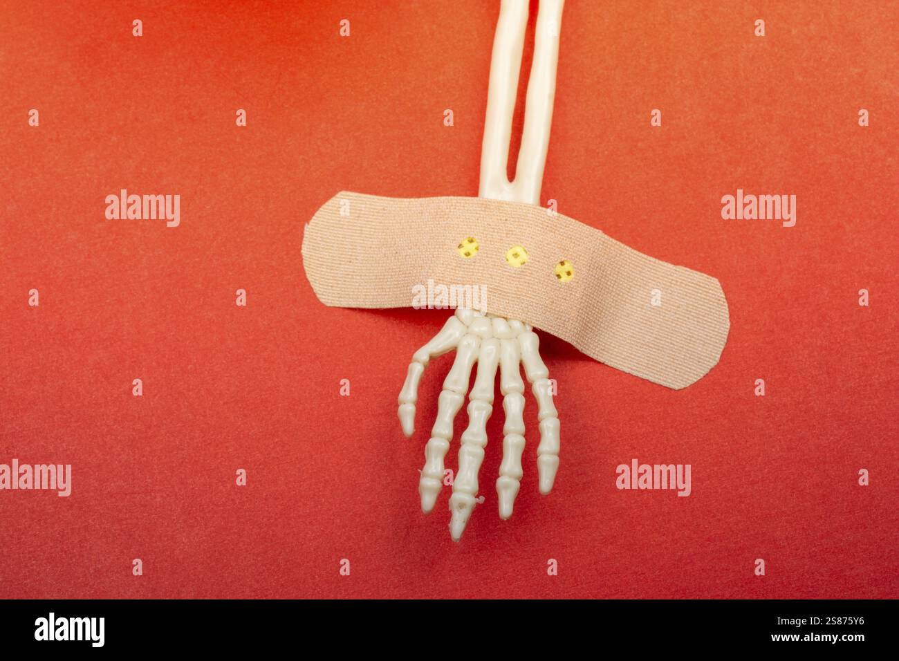 Plaster band on Skeletal hands for death and mistery concept Stock ...