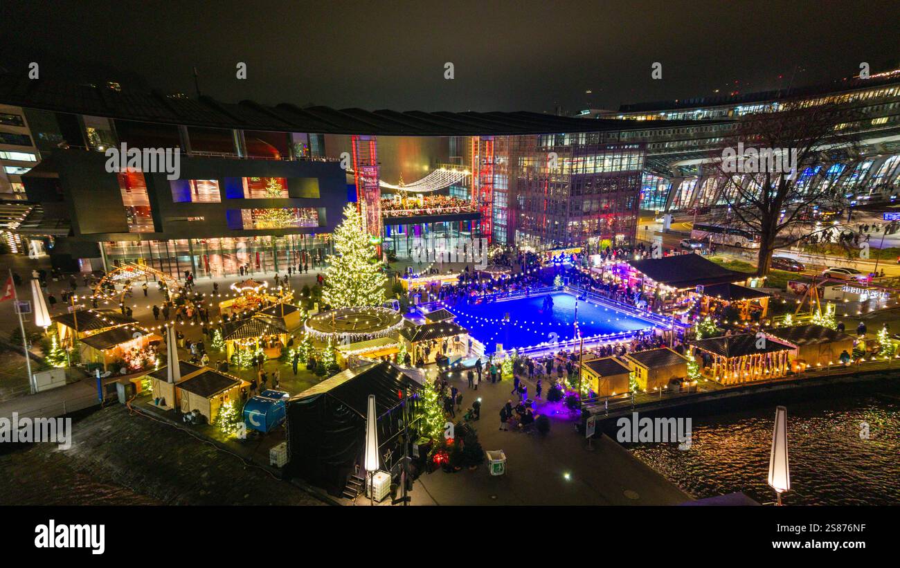 Christmas market and ice rink in Berlin at night Stock Photo - Alamy