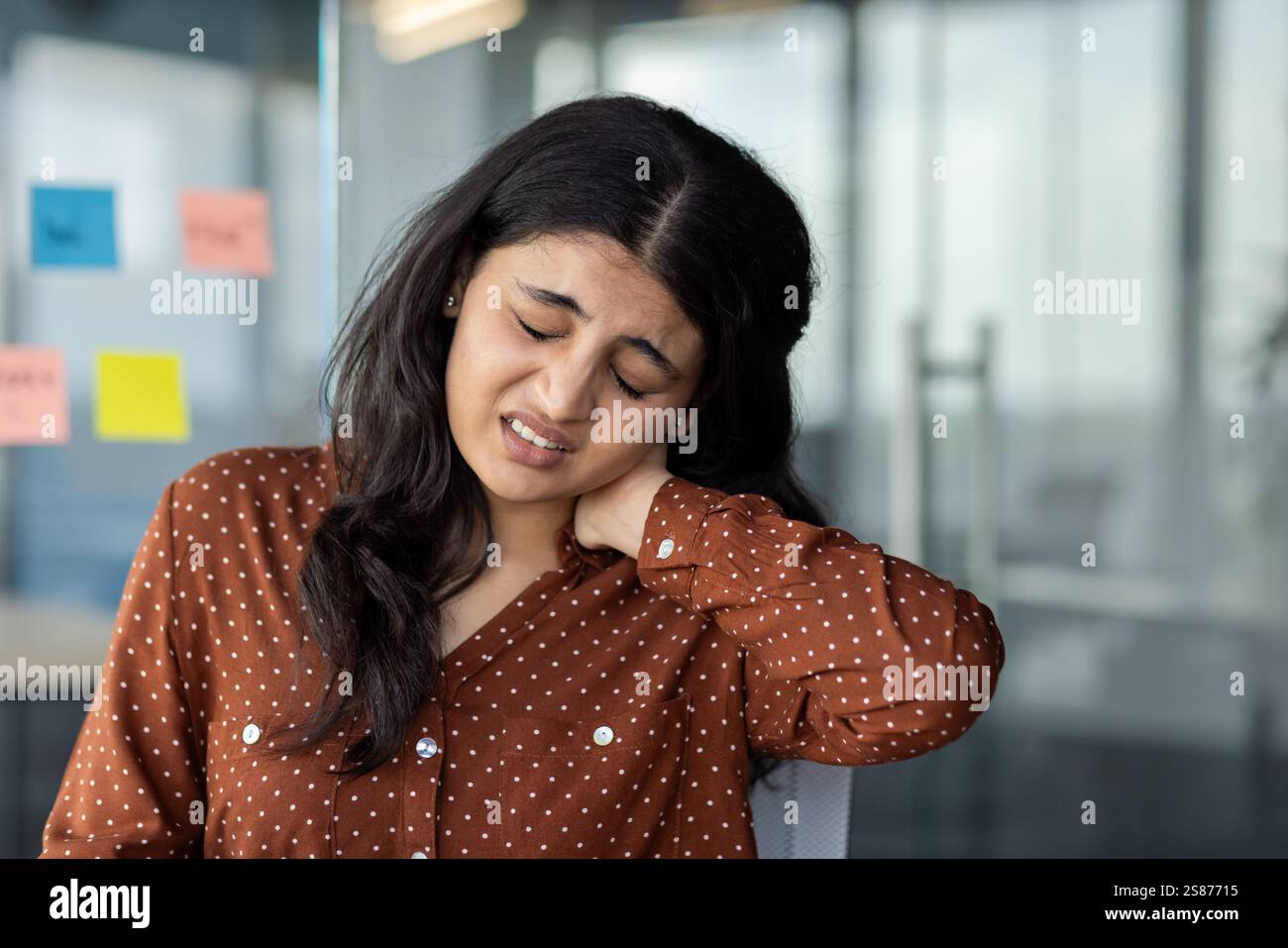 Busy and overworked woman working inside office. Businesswoman has ...