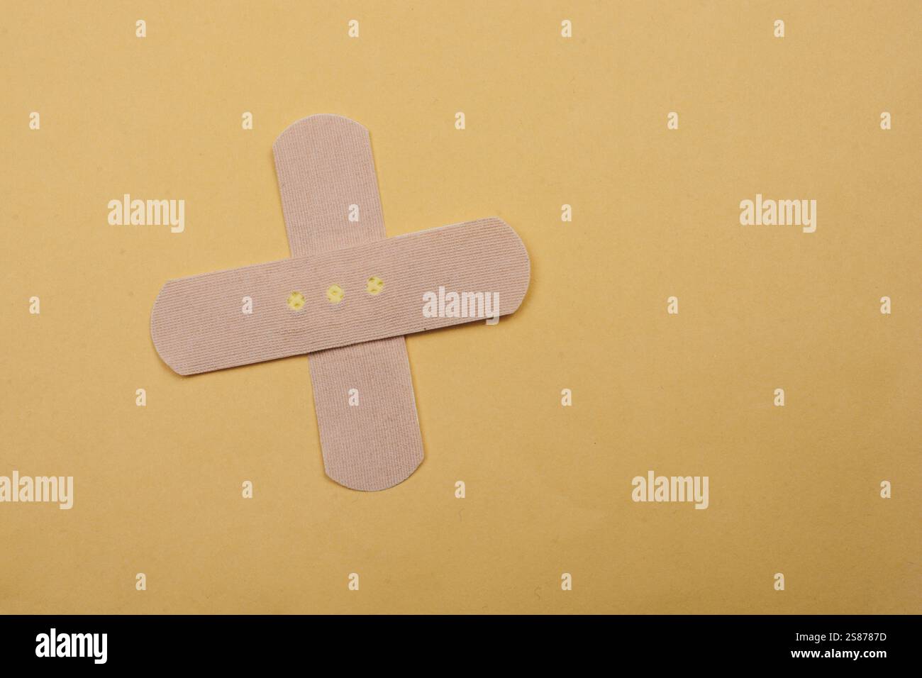 Dressing plasters, wound cross plastering band Stock Photo - Alamy