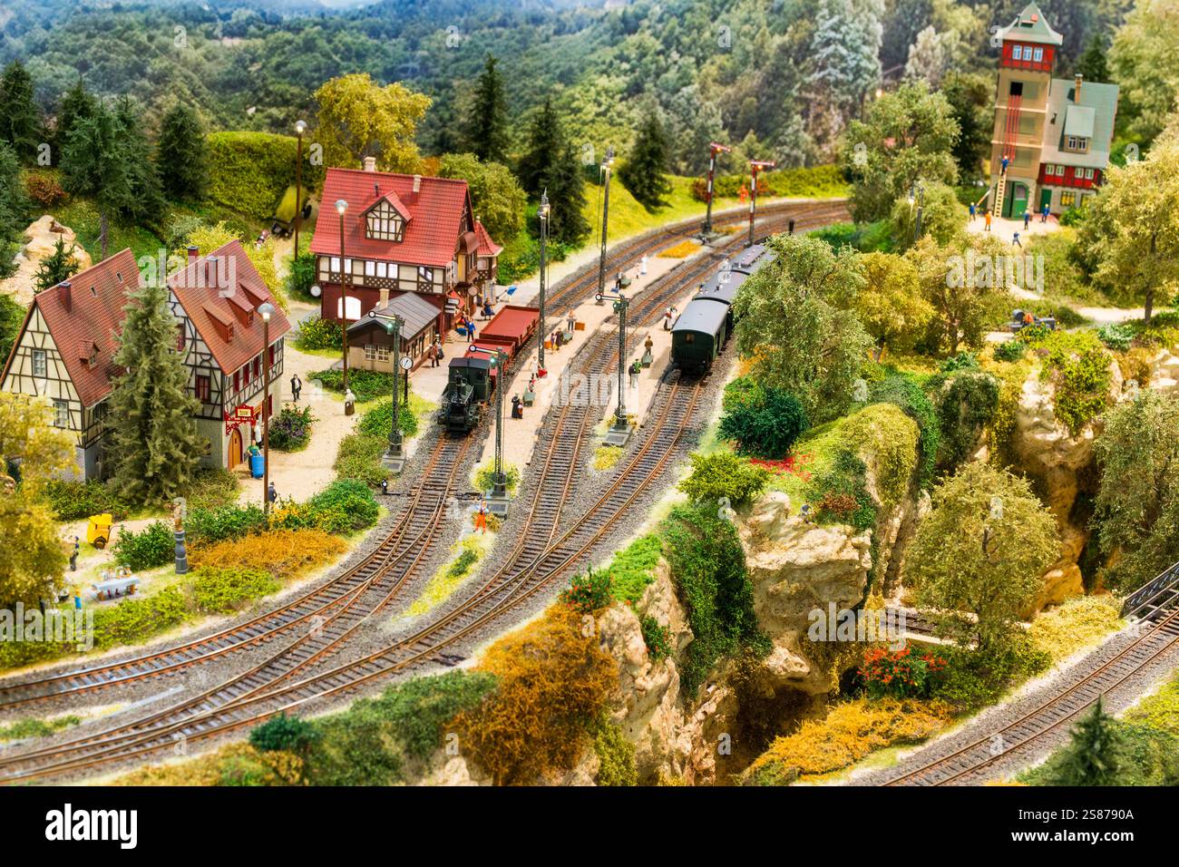 Vintage scene with steam locomotives on H0 gauge model railway layout ...