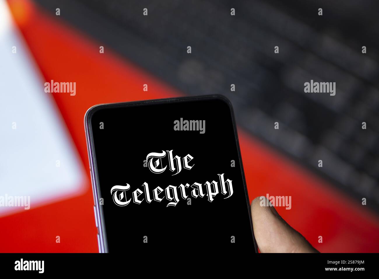 the telegraph logo is displayed on smartphone. The Telegraph is a ...