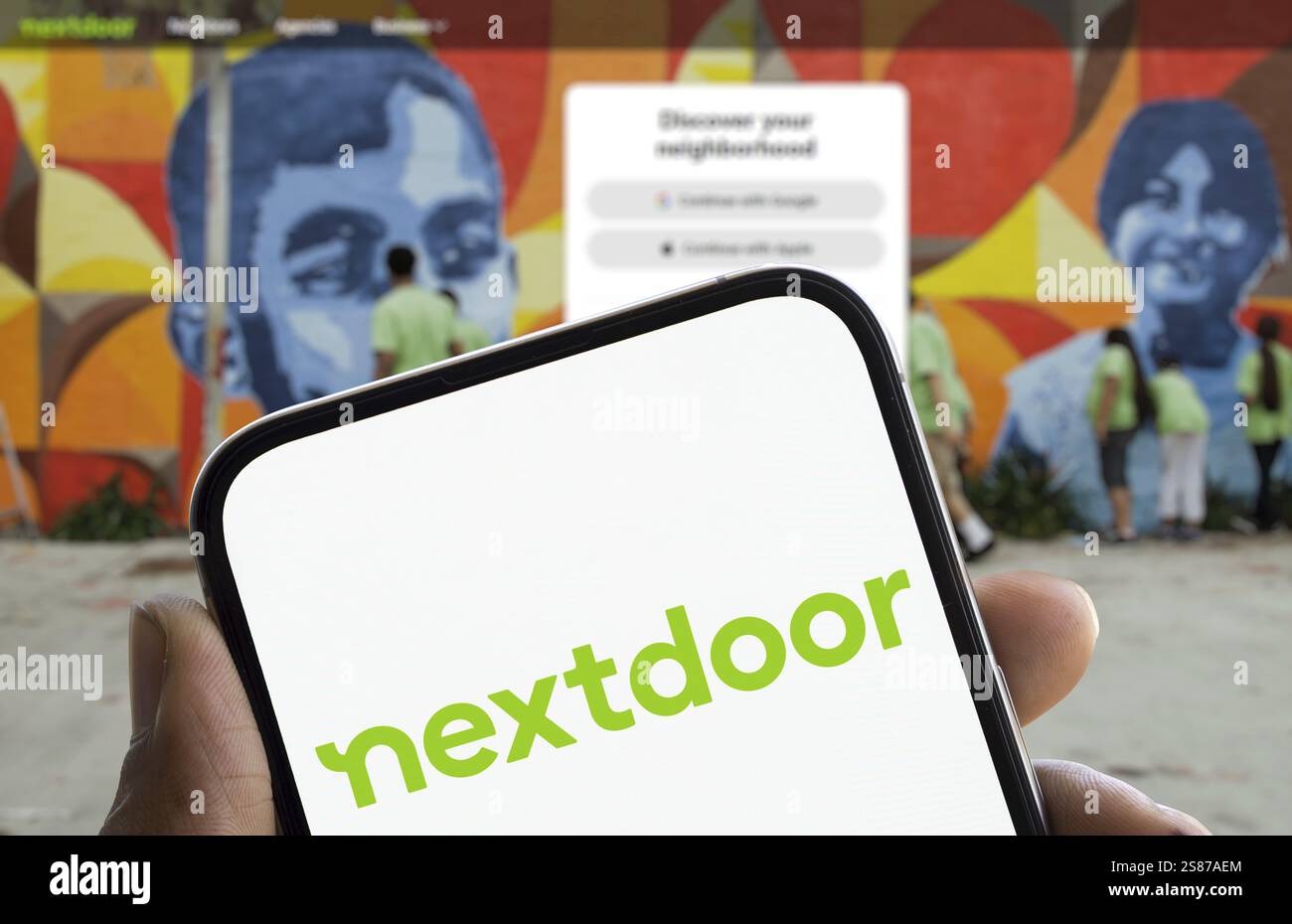 nextdoor logo is displayed on smartphone. Nextdoor Holdings, Inc. is an ...
