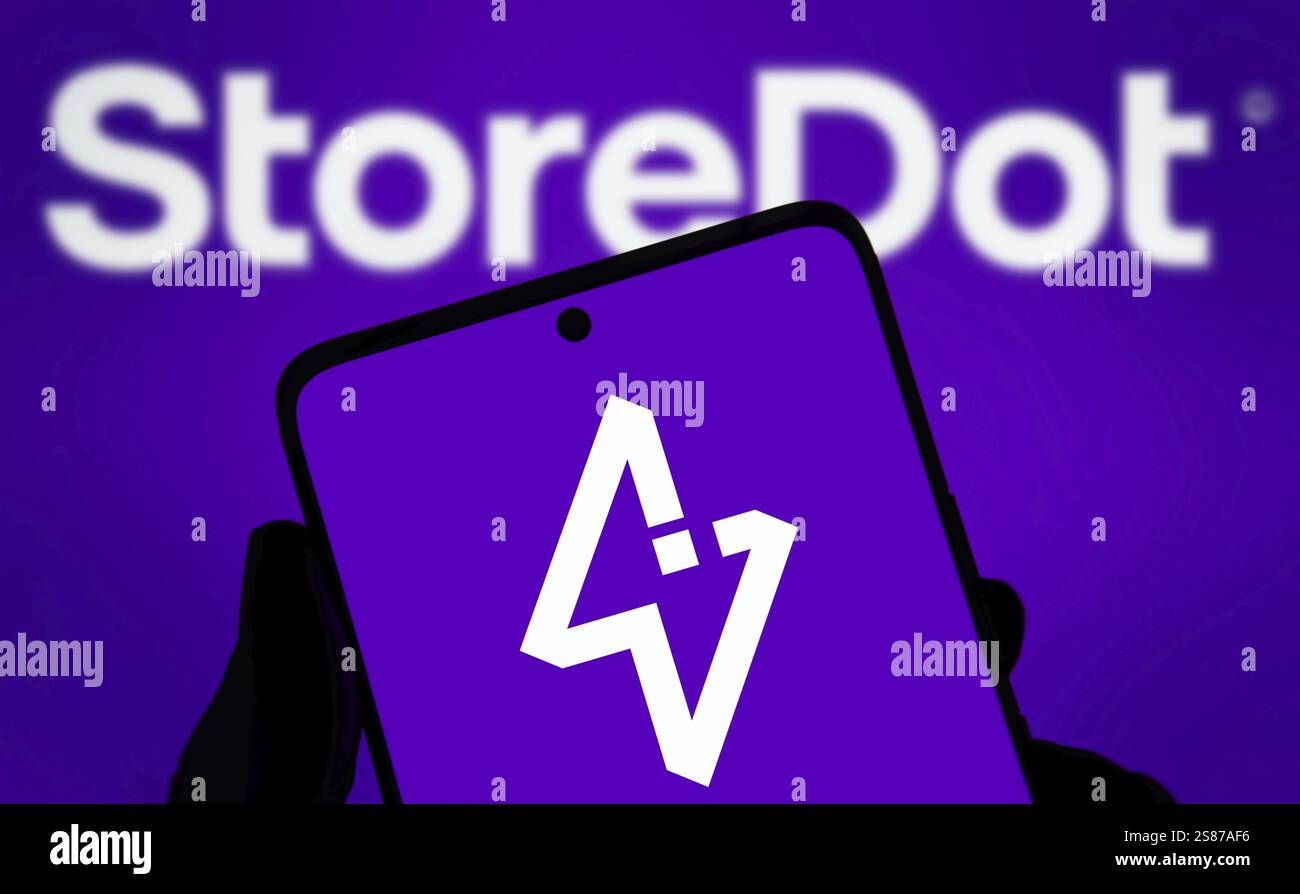 storedot logo is displayed on smartphone. StoreDot is a developer of ...