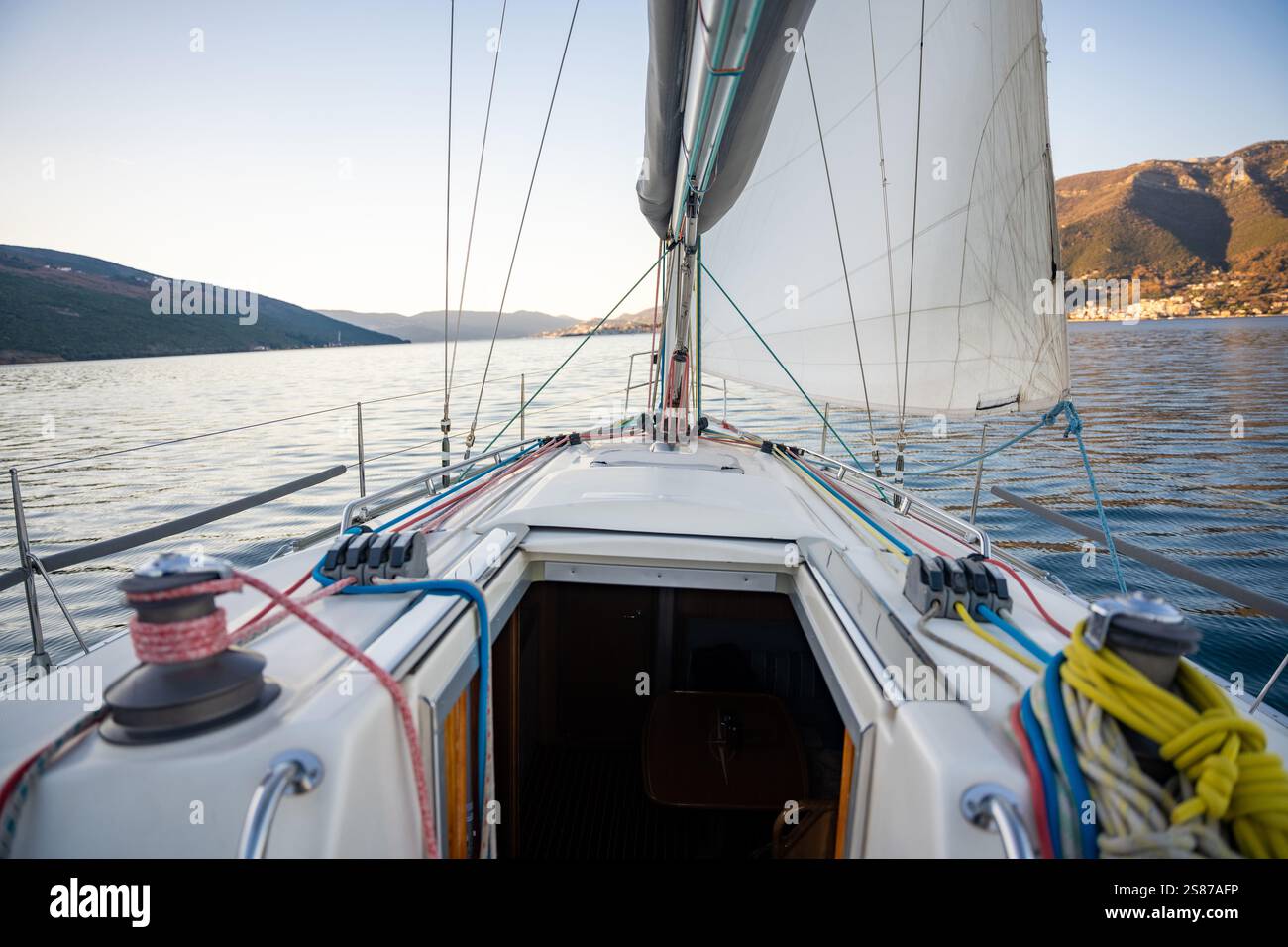 Yacht sailing in Adriatic sea. Close-up view of the deck, mast and ...