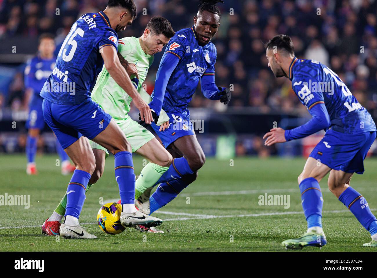 Omar Alderete, Robert Lewandowski , Cristantus Uche seen during LaLiga ...