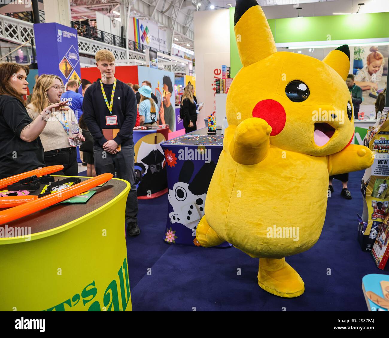London, UK, 21st Jan 2025. Pikachu dances around at a booth. The Toy ...