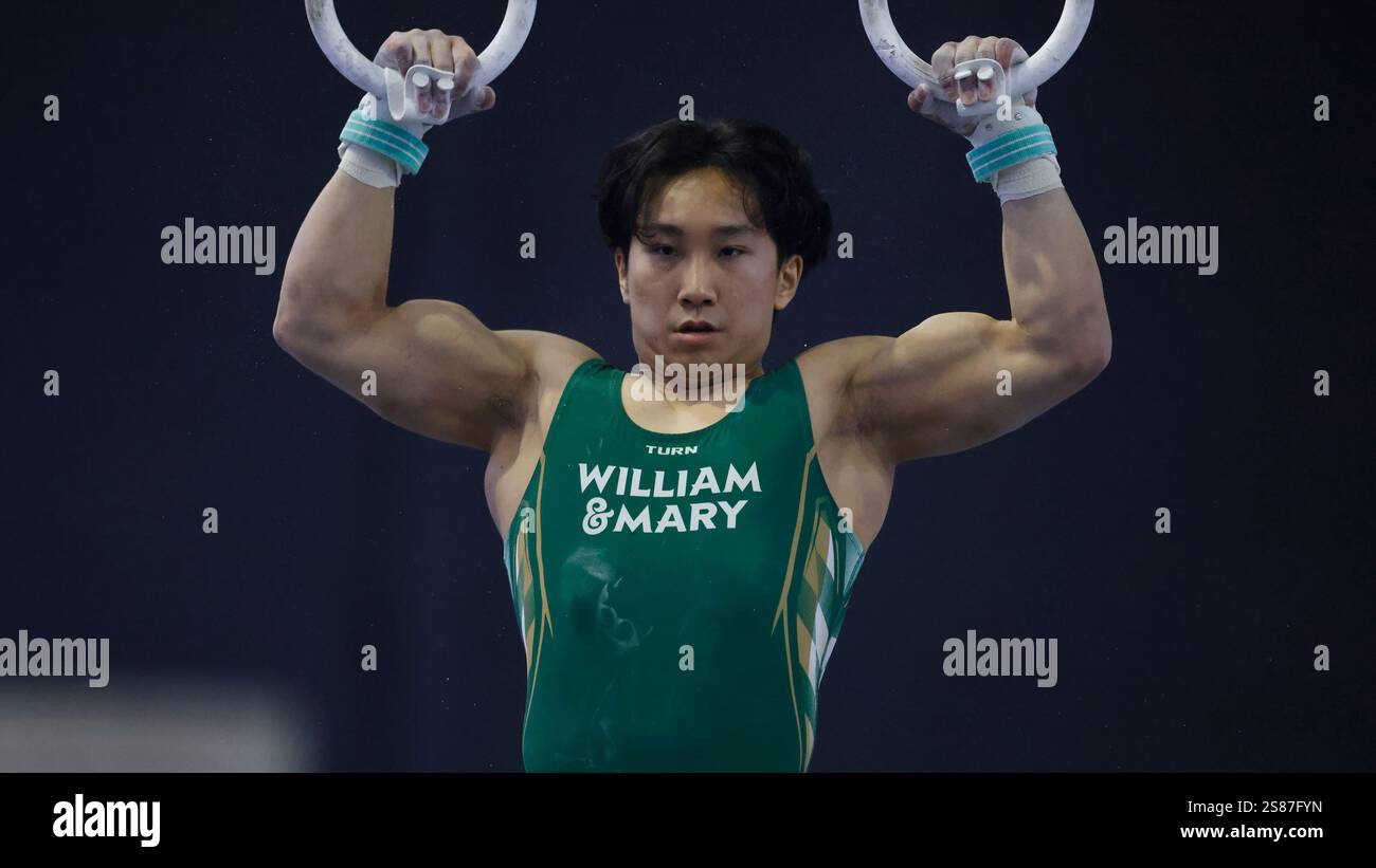 William & Mary gymnast Mark Fu competes on the rings during an NCAA ...