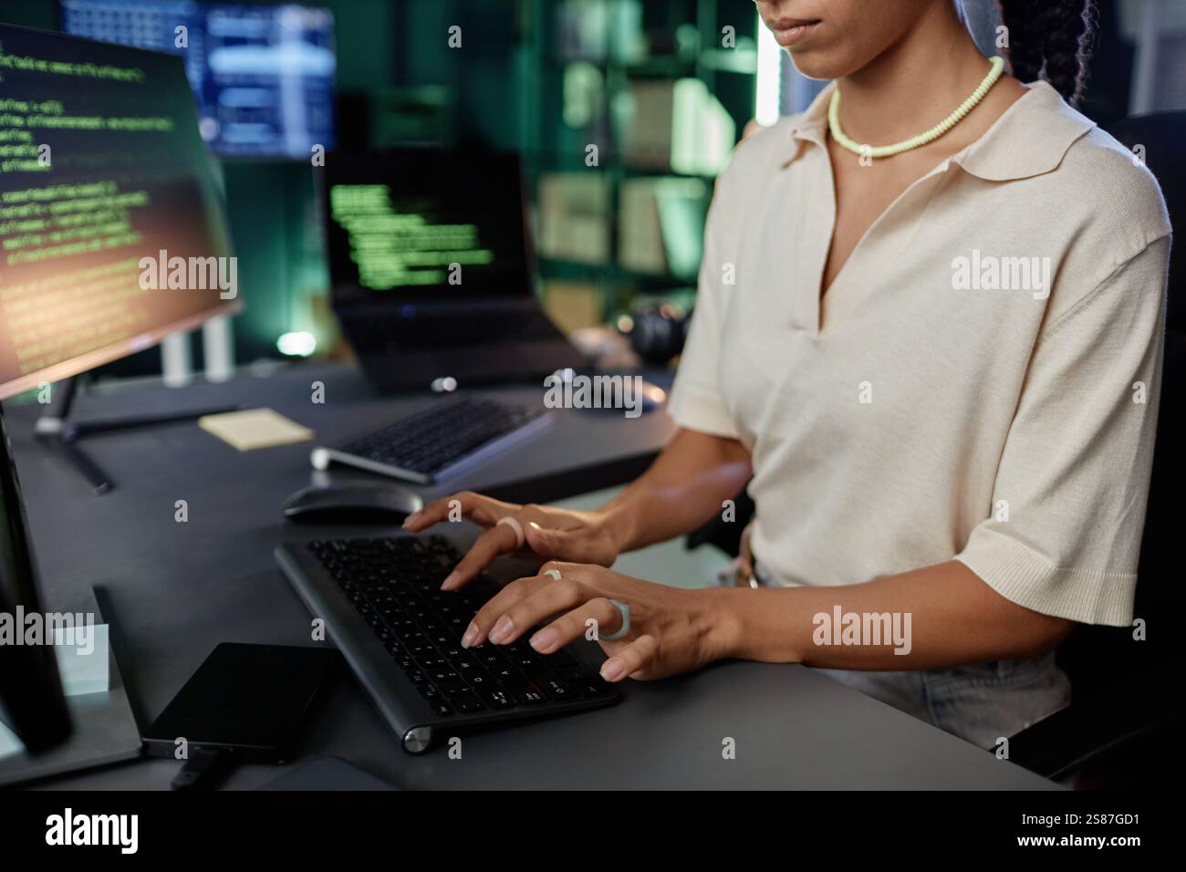 Cropped Shot Of Female It Programmer Typing Source Codes On Computer Keyboard Sitting At