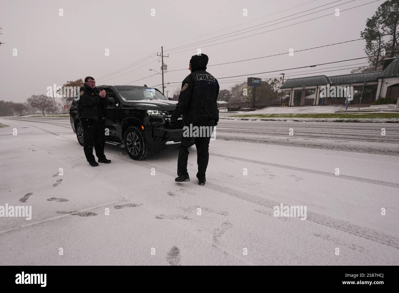 Harahan police respond to a building security alarm during a rare ...
