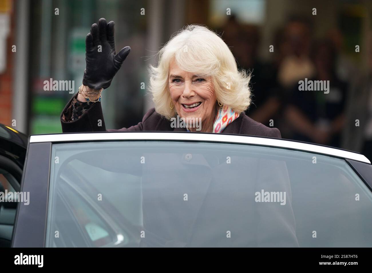 Queen Camilla, President of Prospect Hospice, waves after a visit to ...
