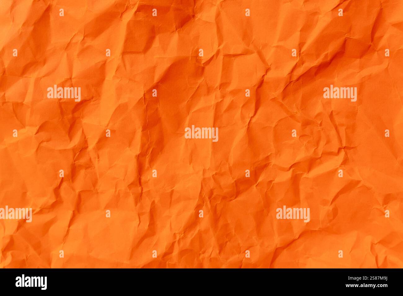 Top view and full frame of wrinkled or crumpled orange paper is used as ...