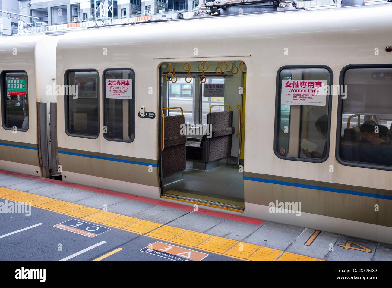 Women Only subway train carriage in Kyoto Japan Stock Photo - Alamy