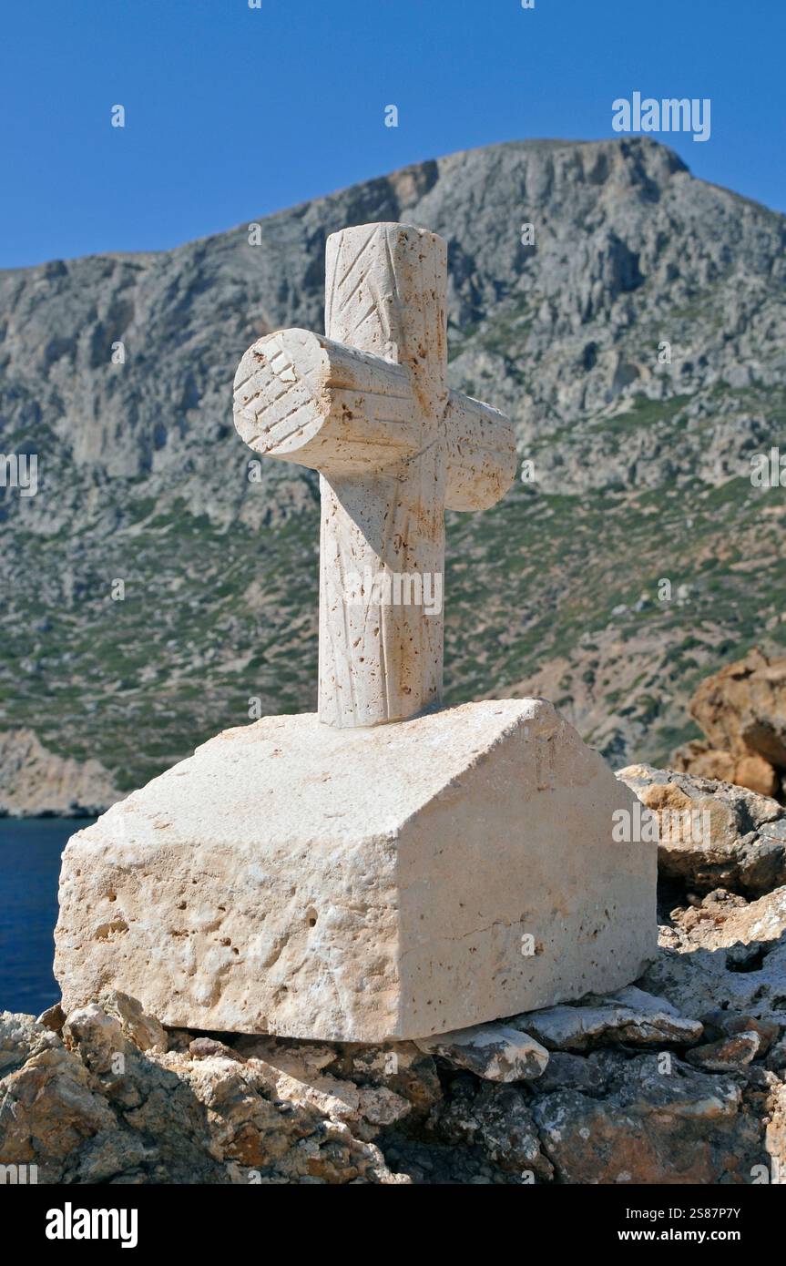 a stone cross in Telendos island, Dodecanese, Greece Stock Photo - Alamy