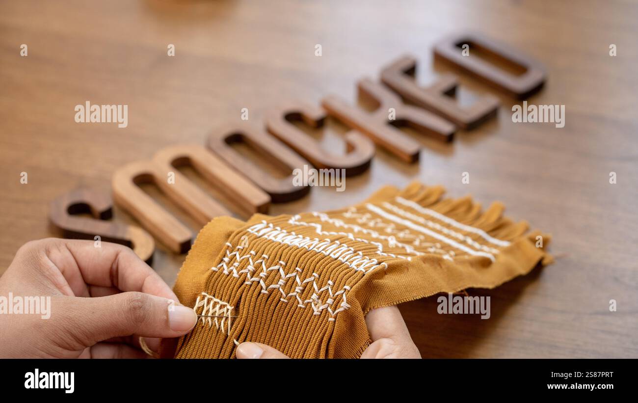 Smocking hi-res stock photography and images - Alamy