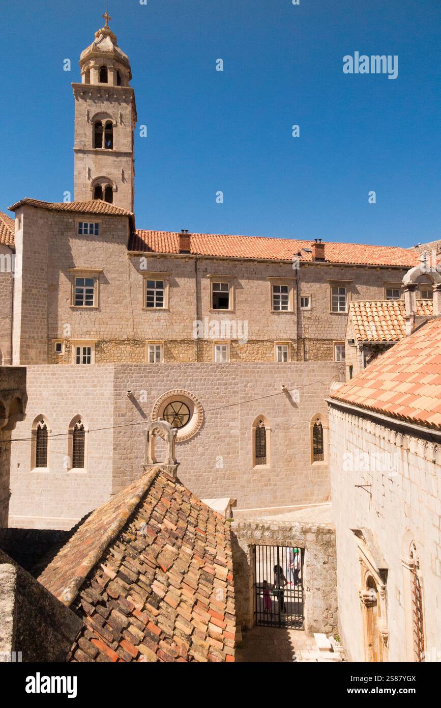 Saint Dominic Church bell tower, in the distance with Christian cross ...