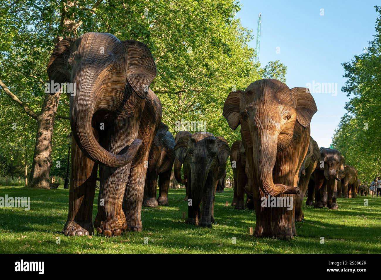 -Editorial Use Only- Life-size elephant herd sculptures photocell, as ...