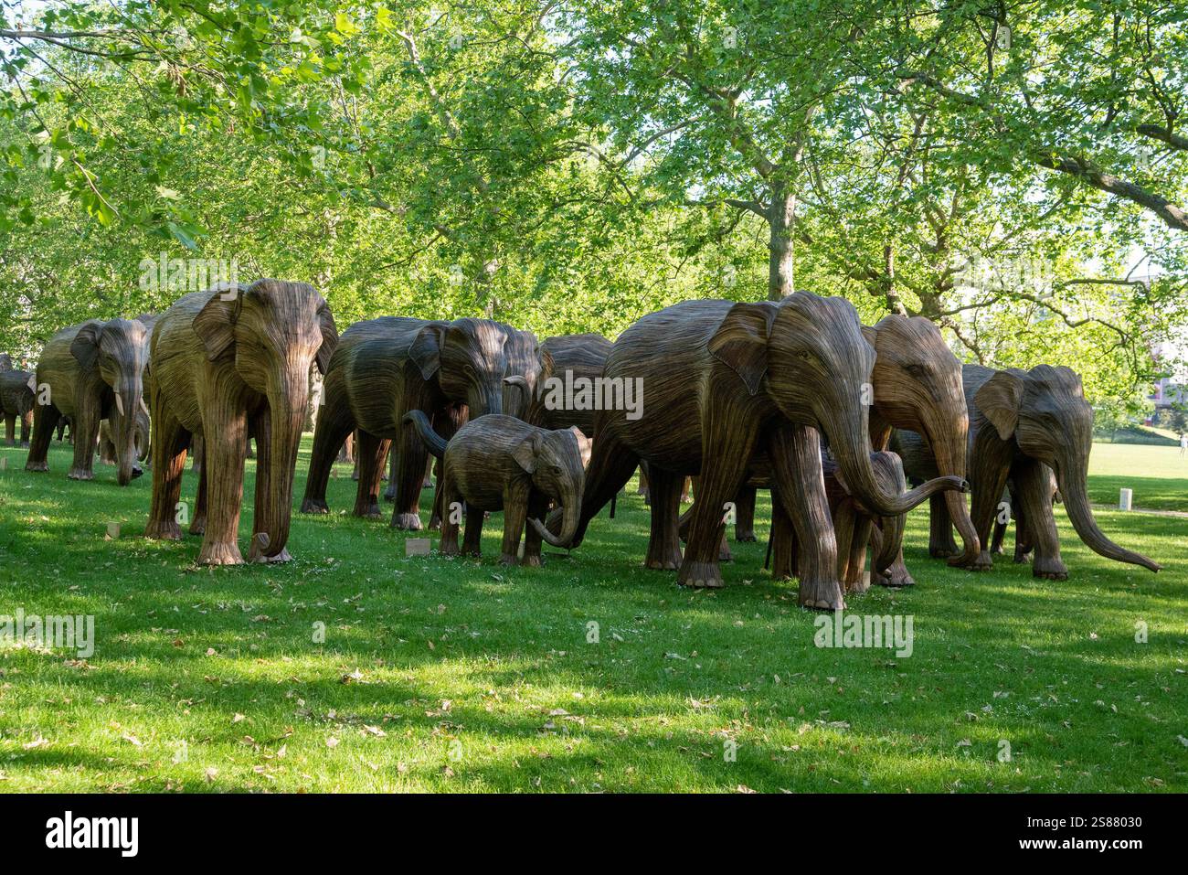 -Editorial Use Only- Life-size elephant herd sculptures photocell, as ...