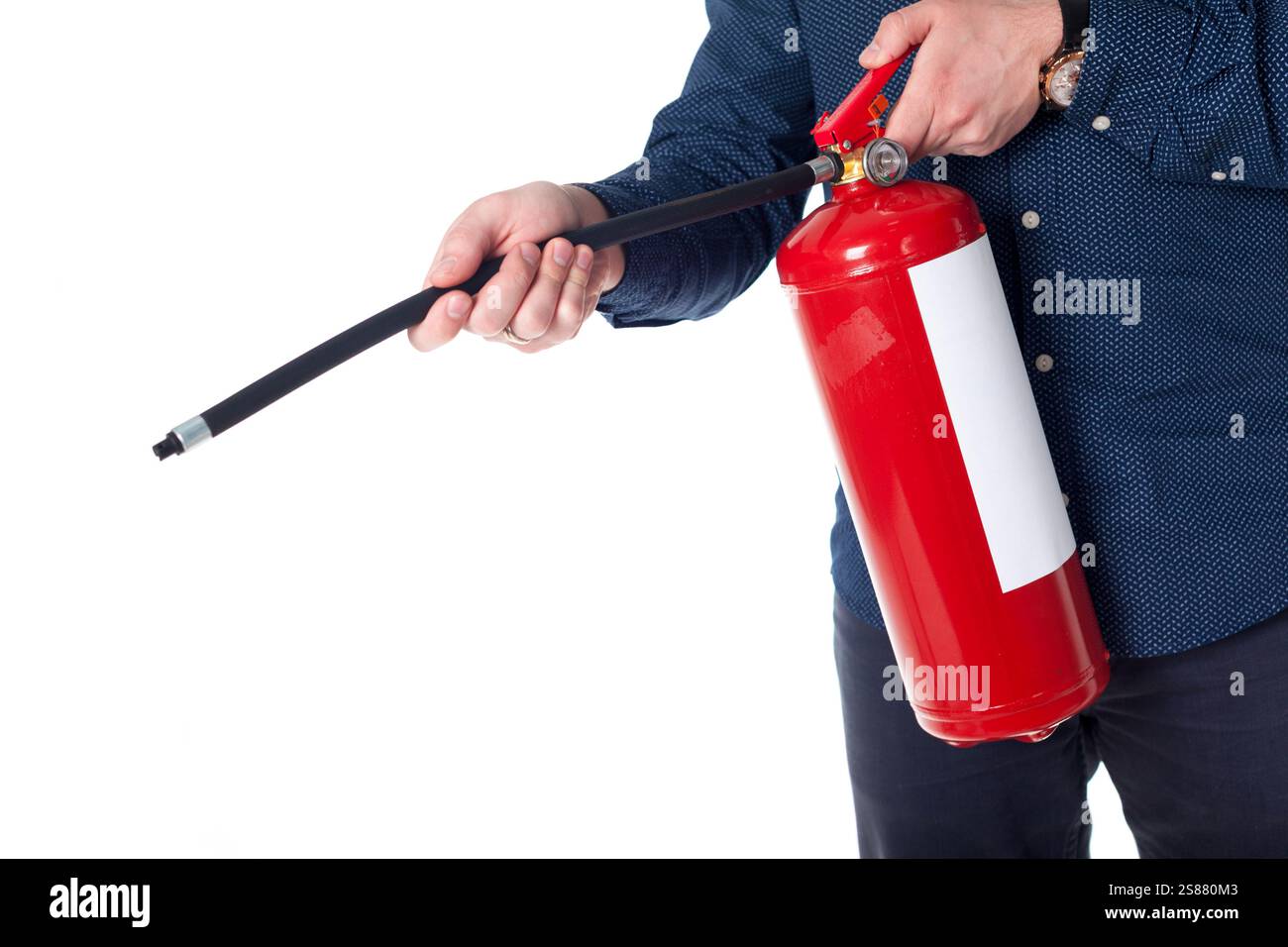 Man using fire extinguisher isolated on white Stock Photo - Alamy