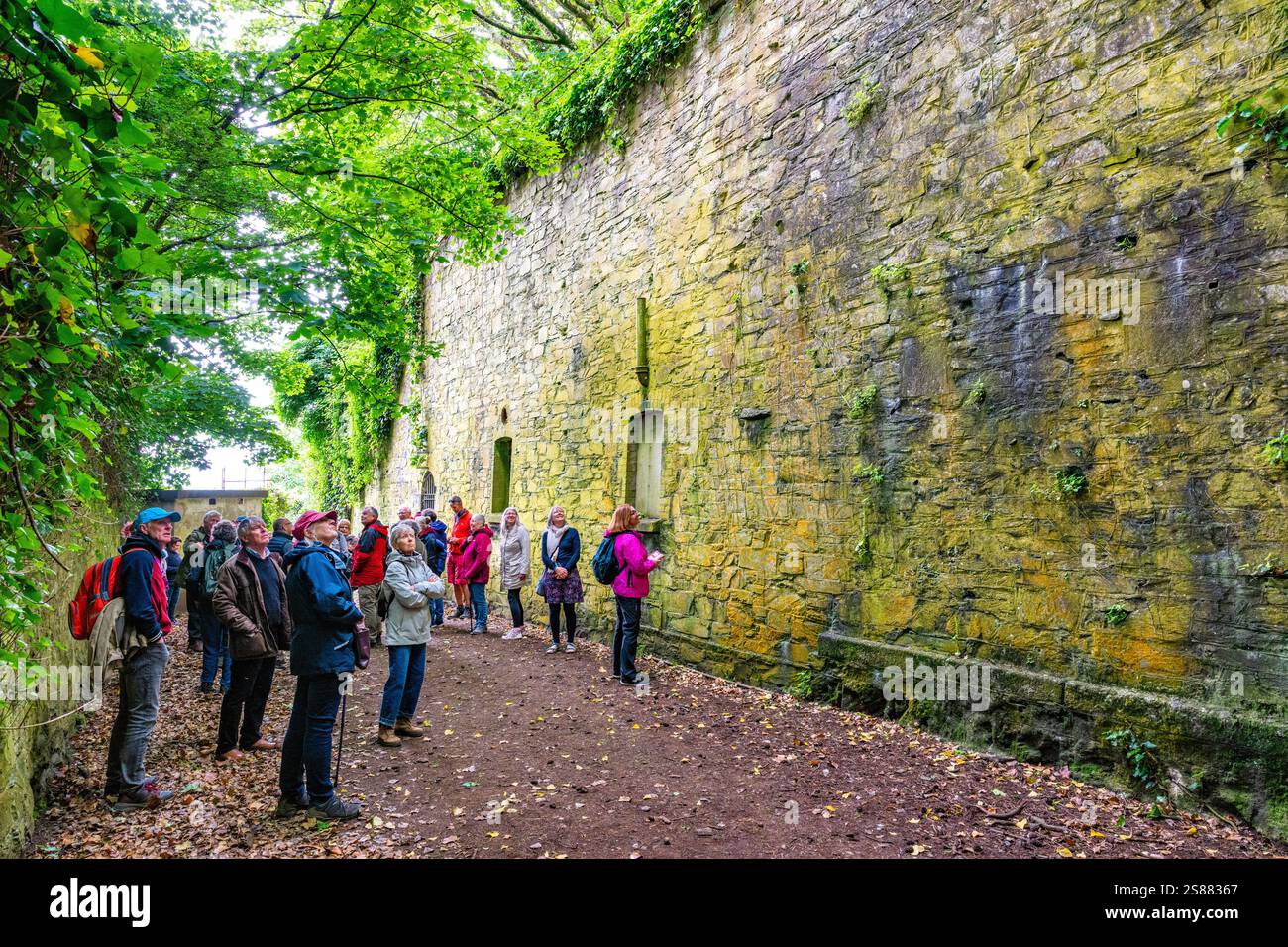 A party of visitors admires the defensive curtain walls on Drake's ...
