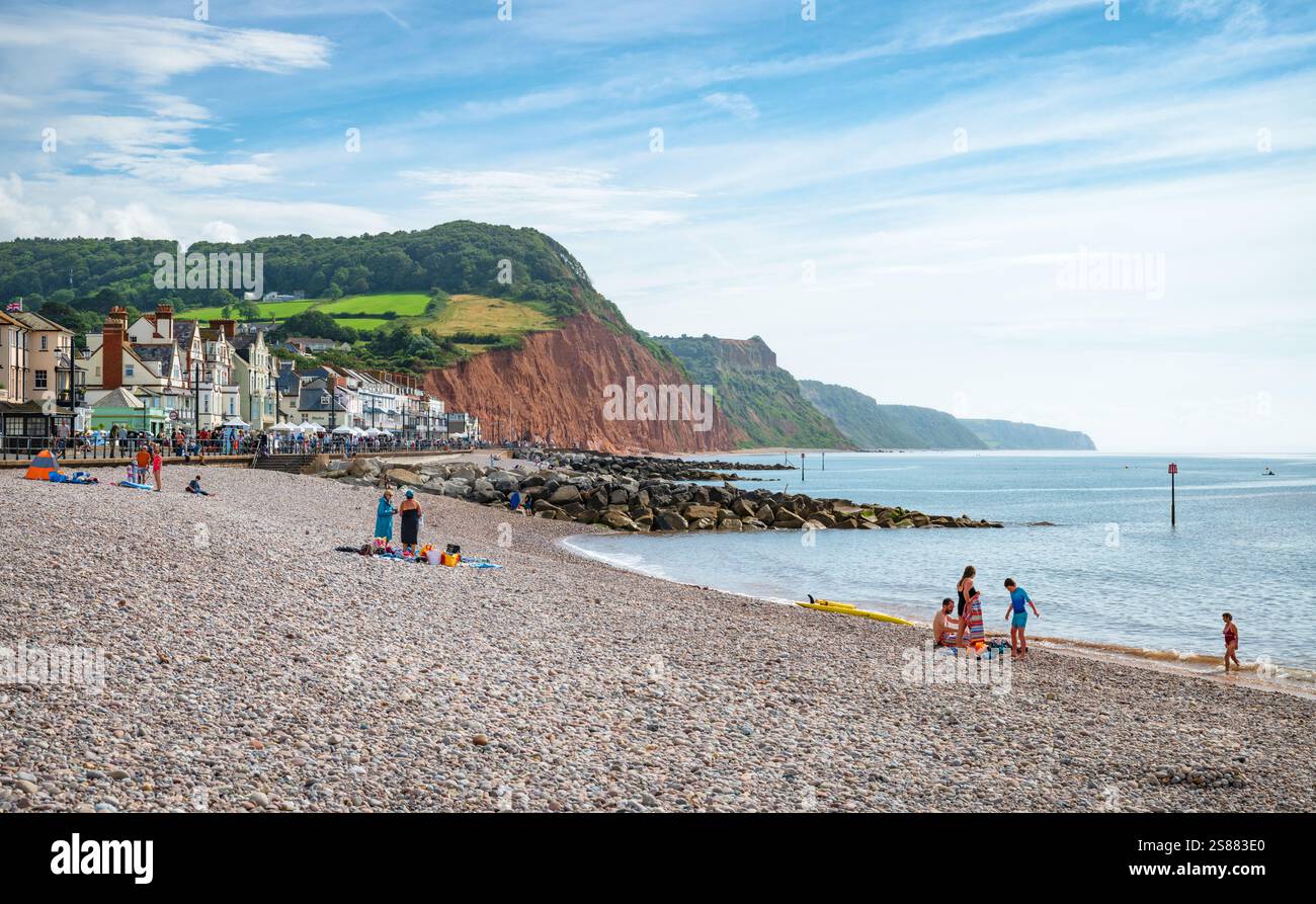 View facing east on the beach at Sidmouth, showing the red cliffs along ...