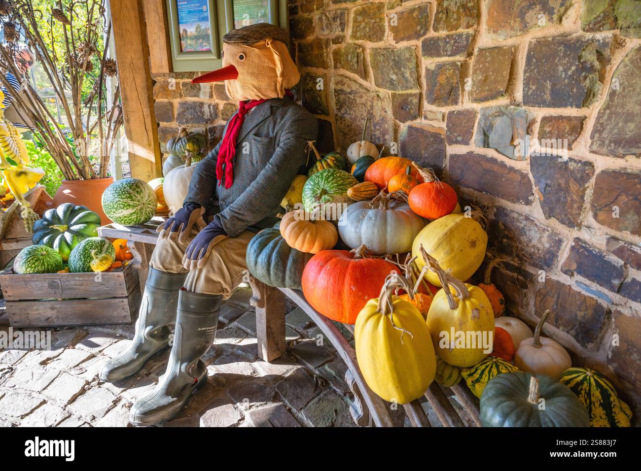 "Scarecrow" man sits in a shelter in the vegetable garden at RHS Garden ...