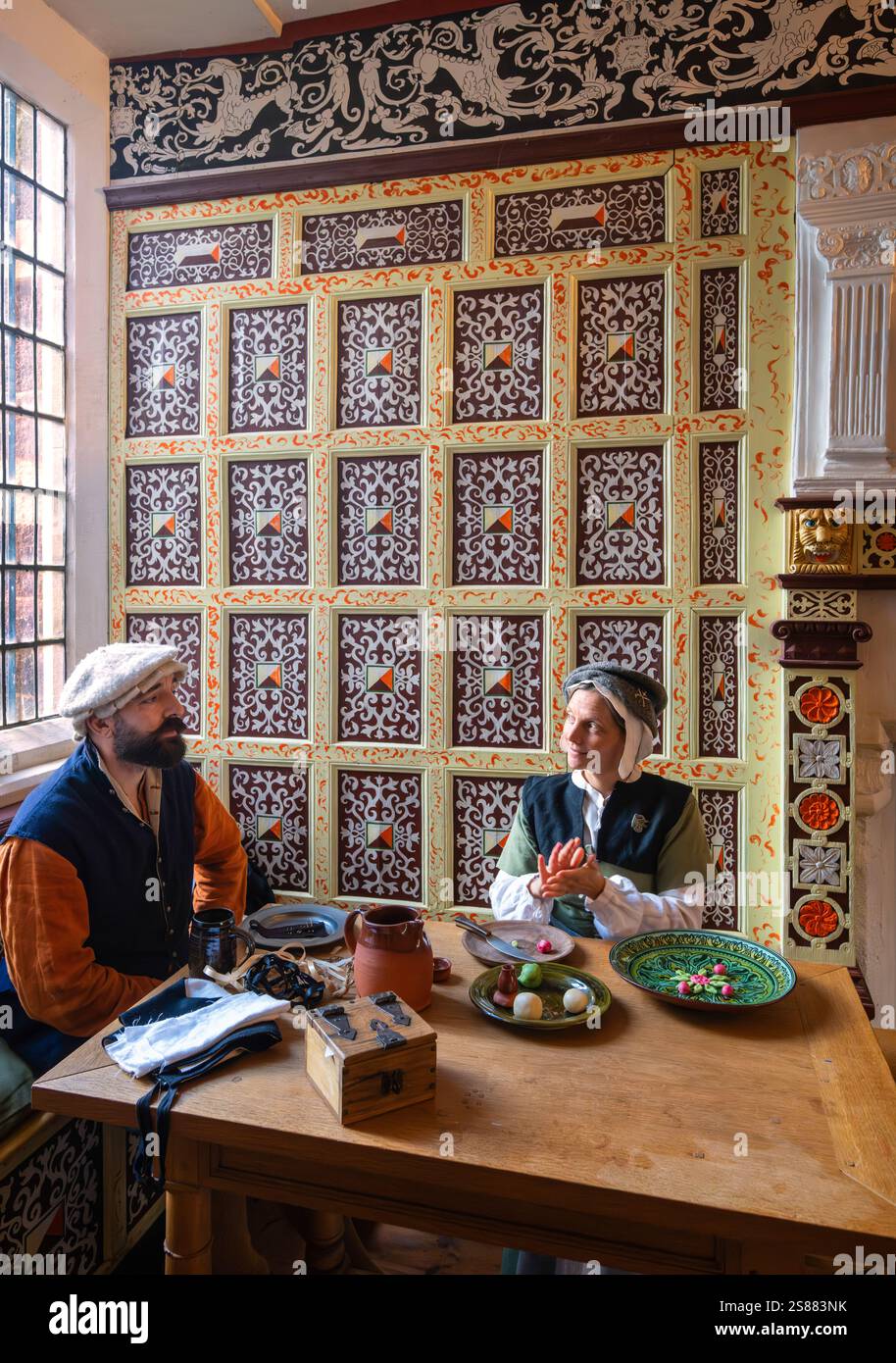 Enactors making decorations for a Tudor Christmas at Saint Nicholas ...