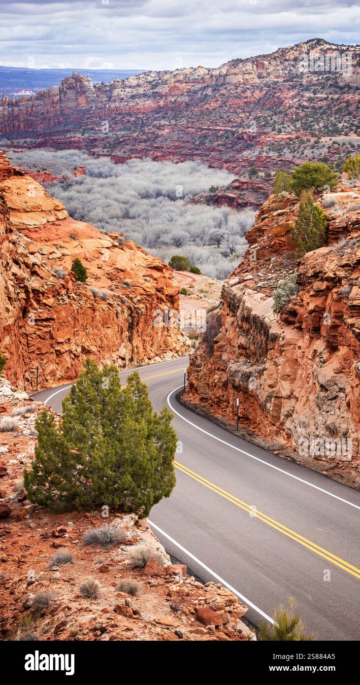 A winding road in Utah stretches through a breathtaking rocky landscape ...