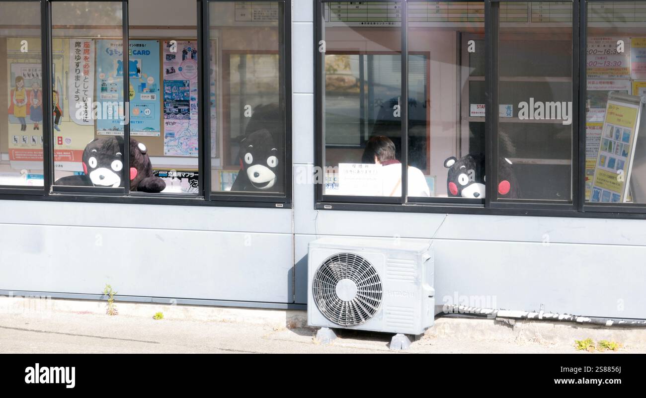 Aso, Japan -January 16 2025: Kumamon doll display in Aso train statoin ...