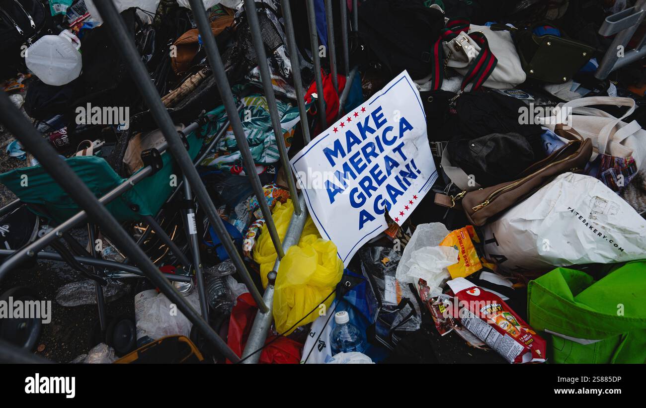 A ‘Make America Great Again’ sits atop a pile of trash and debris ...