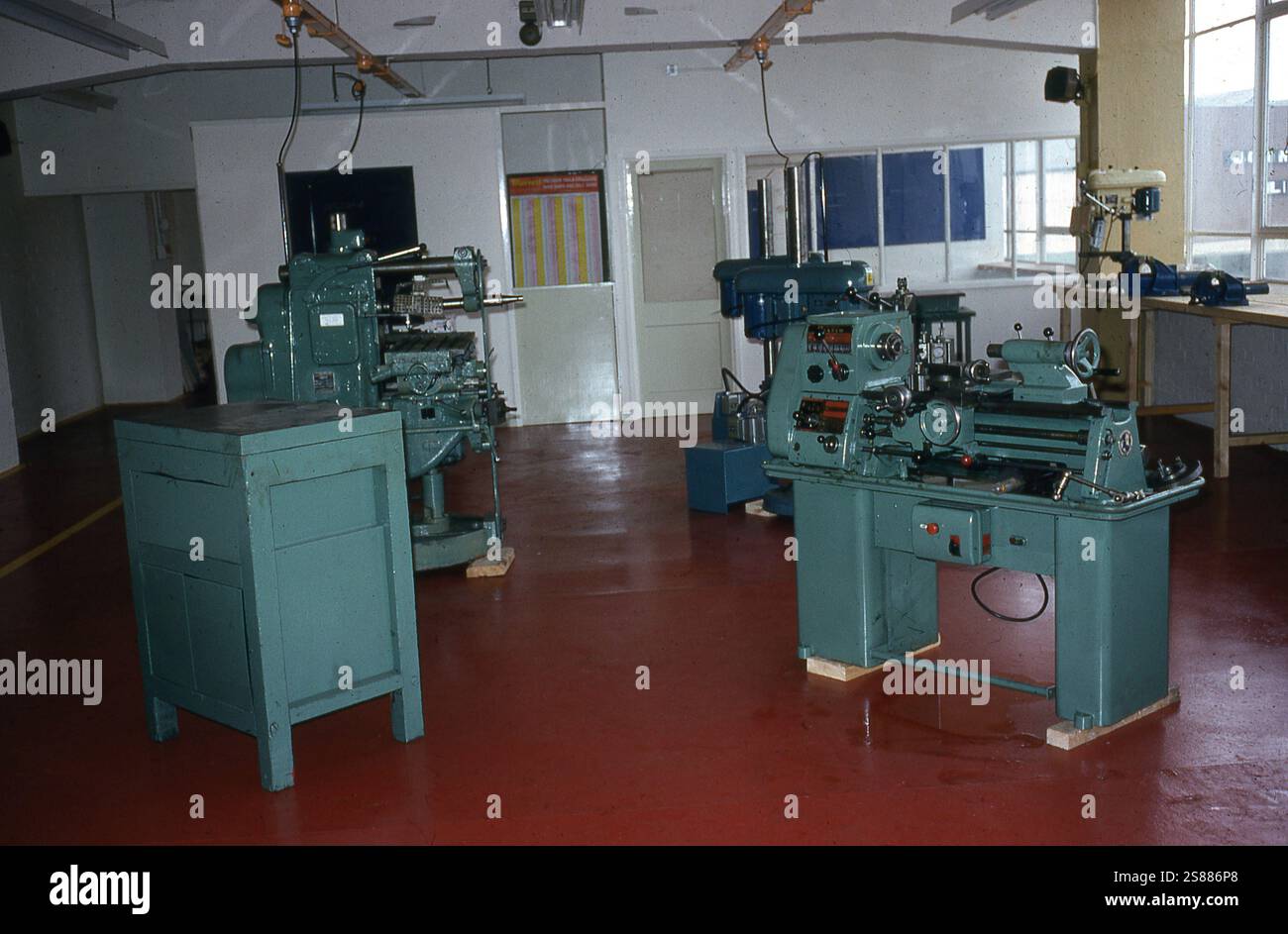 1970, light engineering, a number of metal-working lathes inside a room ...