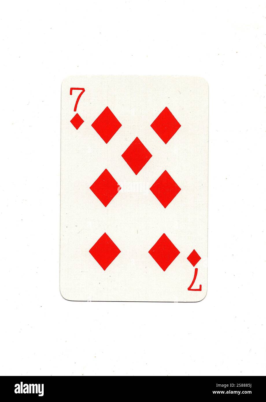 A vintage seven of diamonds playing card isolated on a white background ...