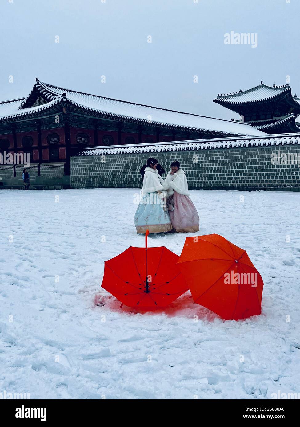 Seoul, South Korea - January 5th, 2025 - Two girls in traditional ...