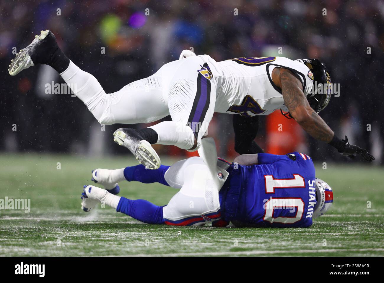 Baltimore Ravens linebacker Chris Board (49) tackles Buffalo Bills wide ...
