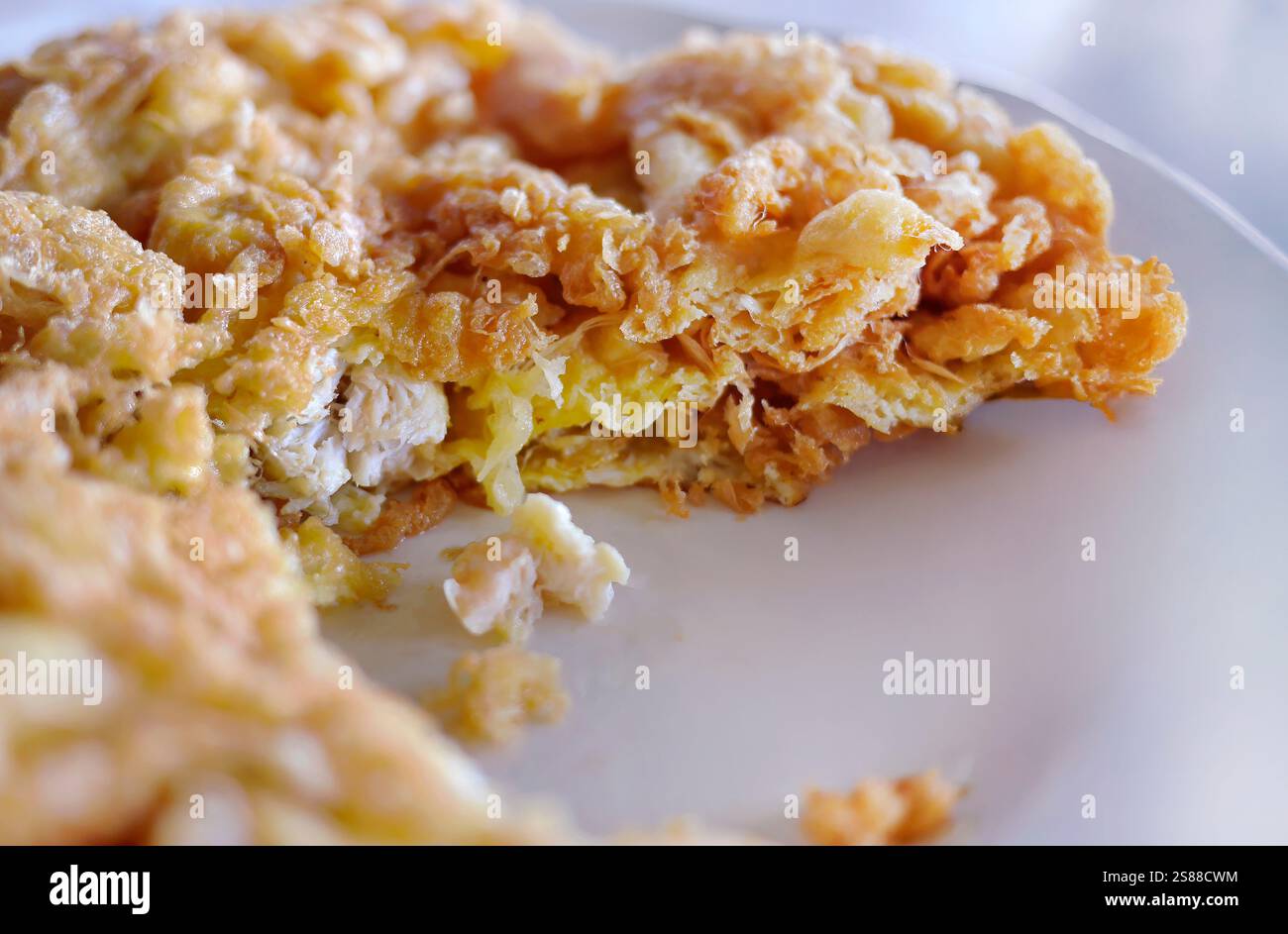 Deep fried crab omelette Thai style, crispy, thick and oily, unhealthy ...