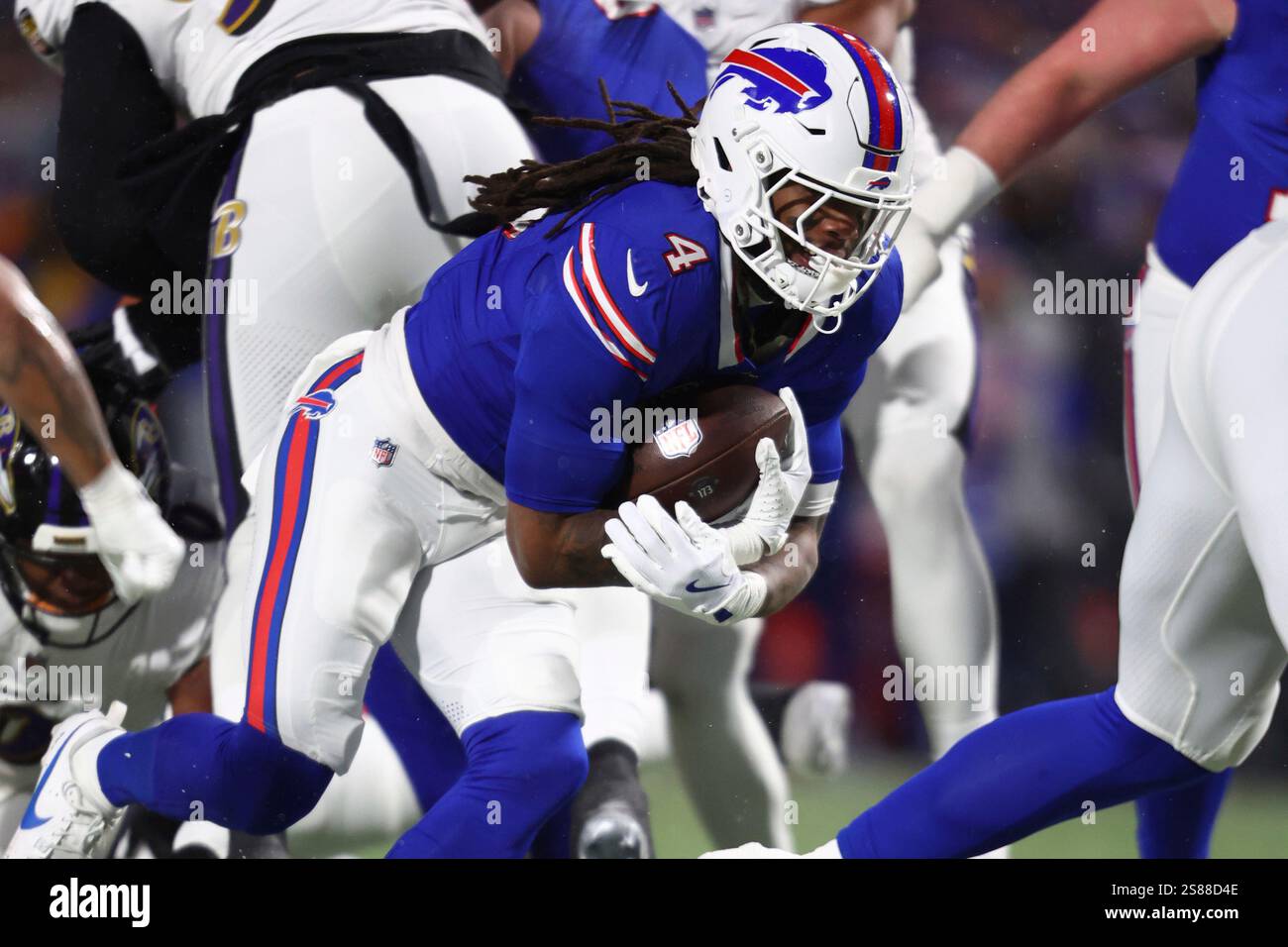 Buffalo Bills running back James Cook (4) carries the ball during the ...