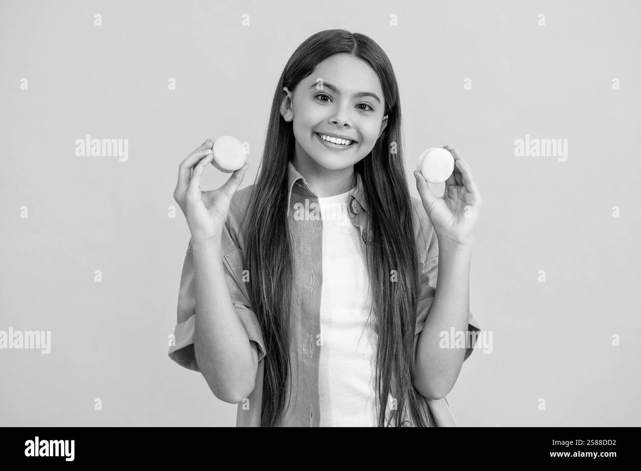 girl with macaroon. yummy macaroon dessert. teen girl savoring a ...