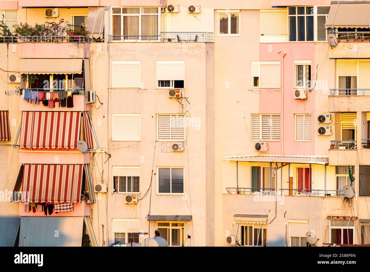 Colorful facade of typical residential apartment block in Tirana ...