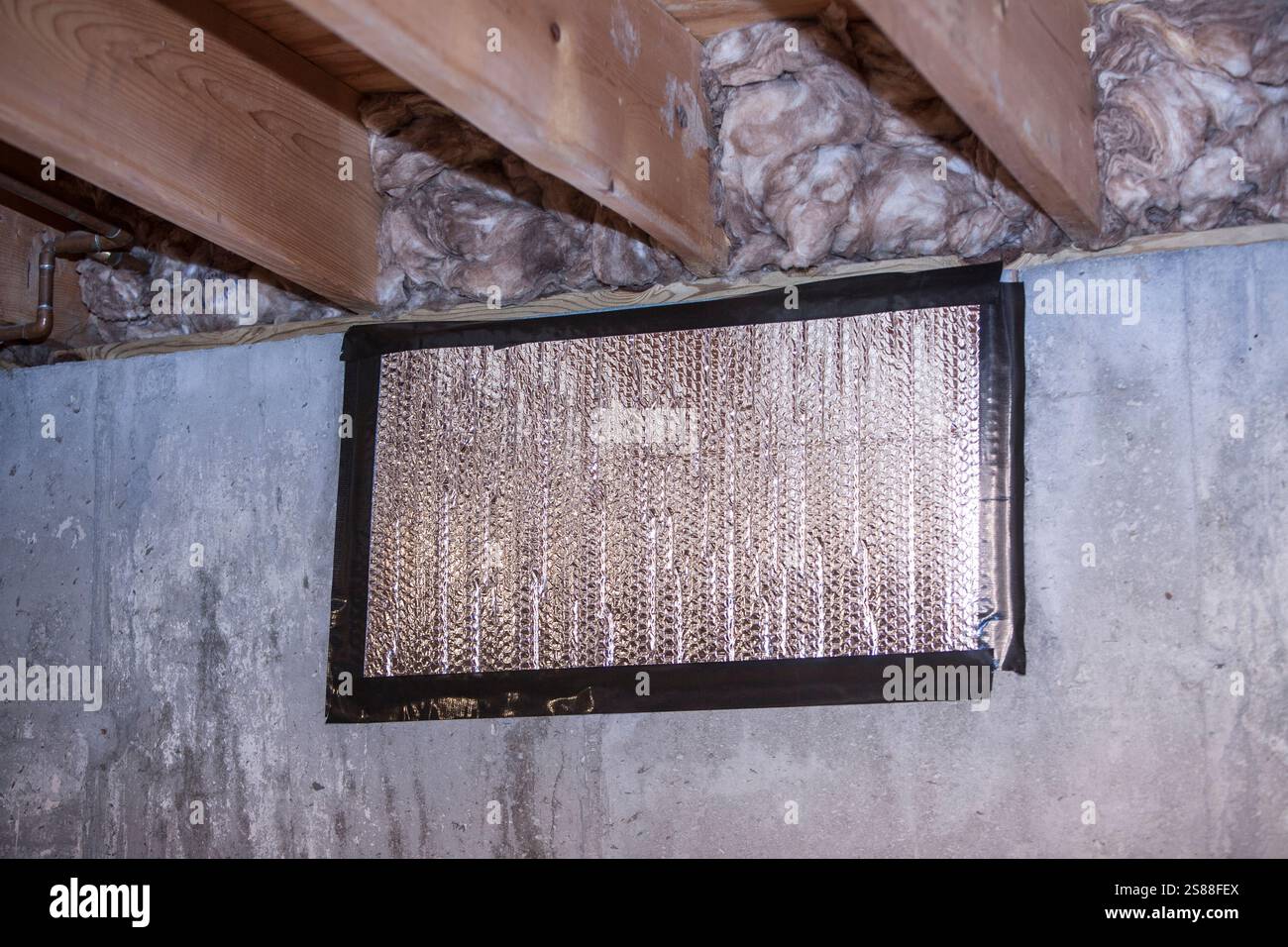 Insulated window that's in the basement Stock Photo - Alamy