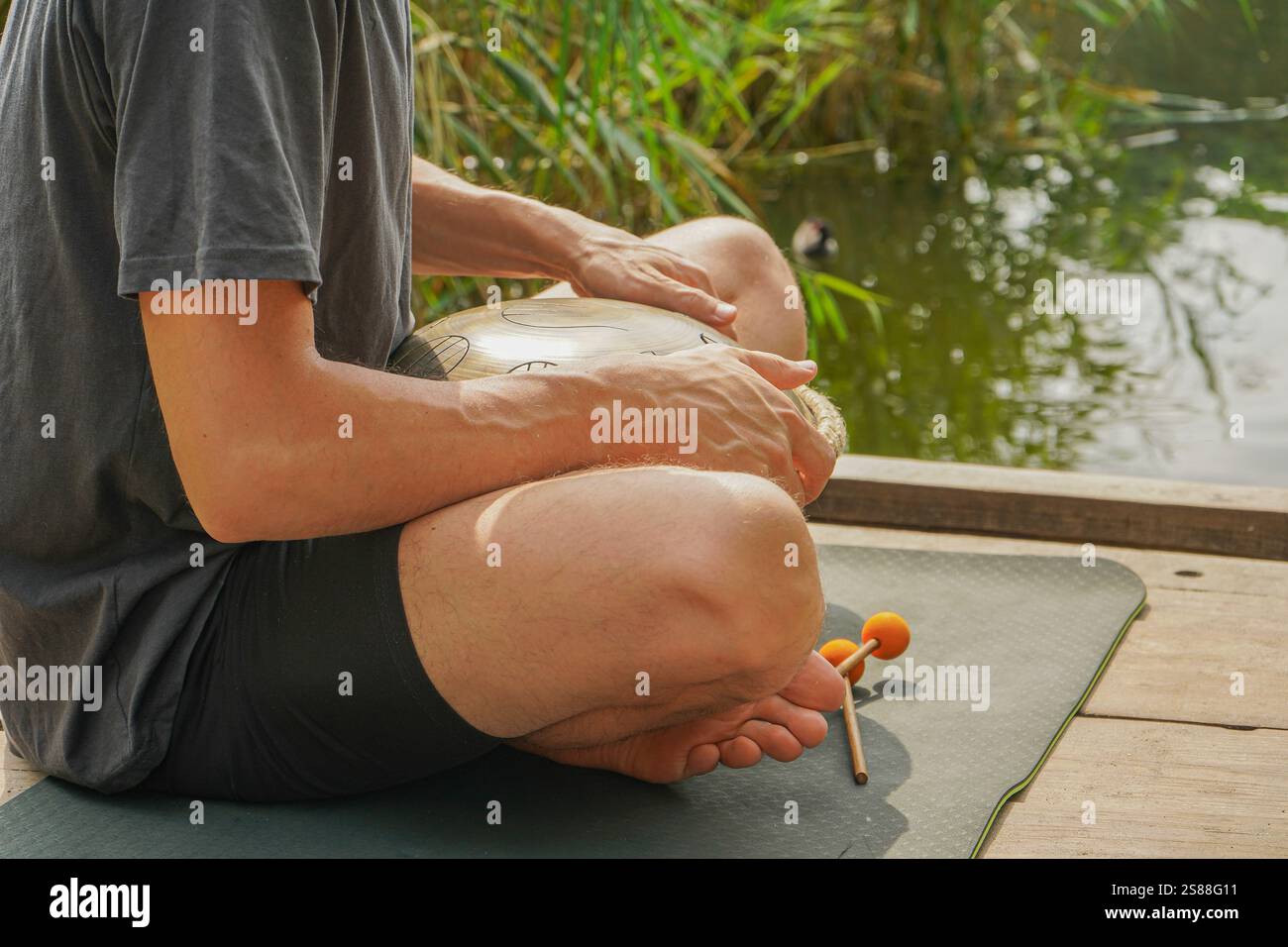 The melody of the handpan is peaceful and calming in nature. Near a ...