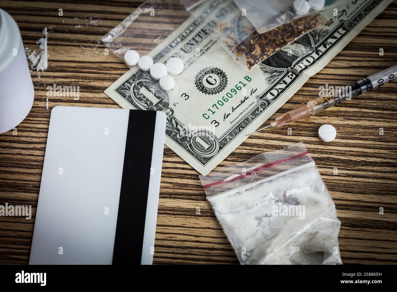 Drug syringe and cooked heroin Stock Photo - Alamy