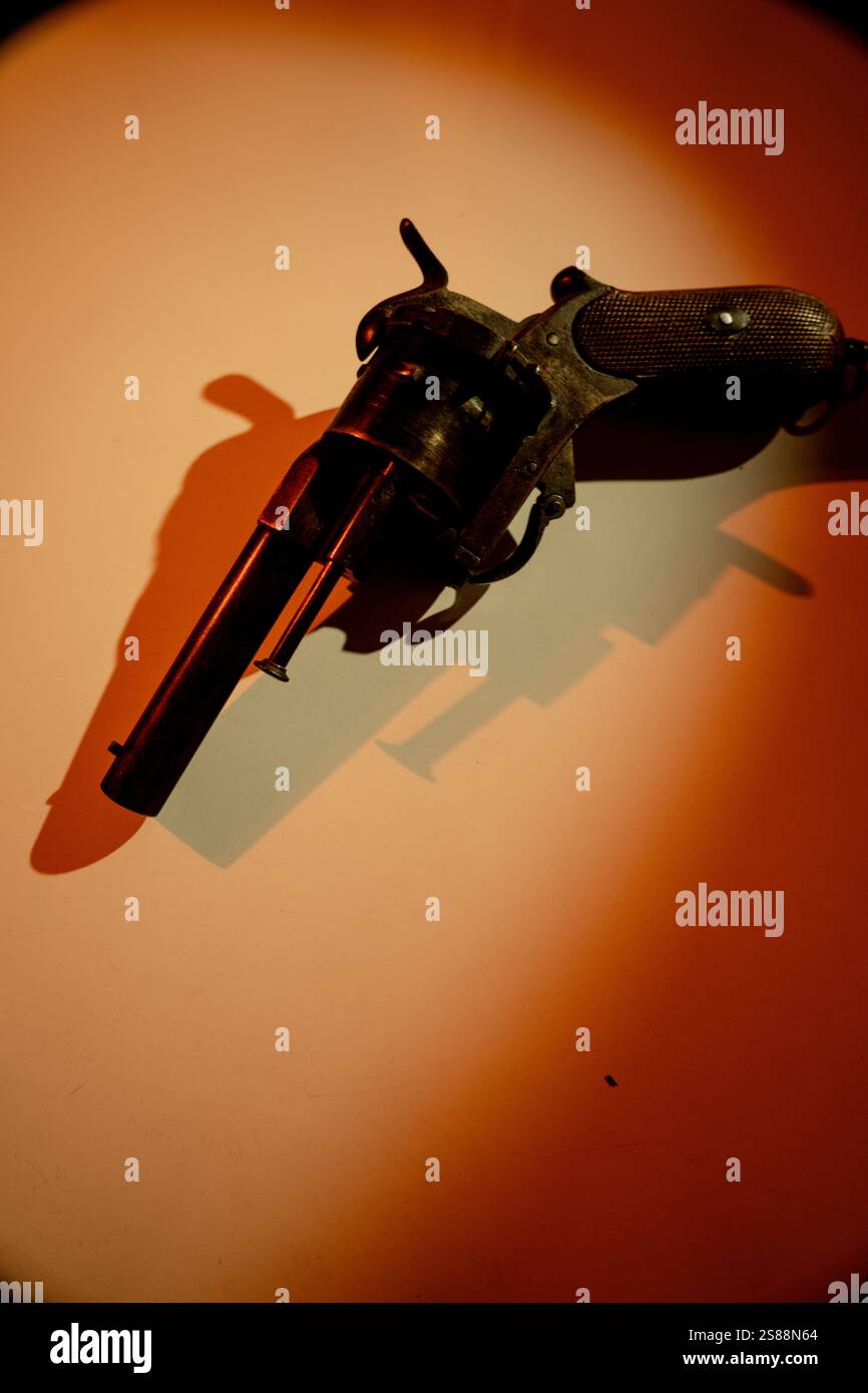 Pistol gun artistic photograph book cover design Stock Photo - Alamy